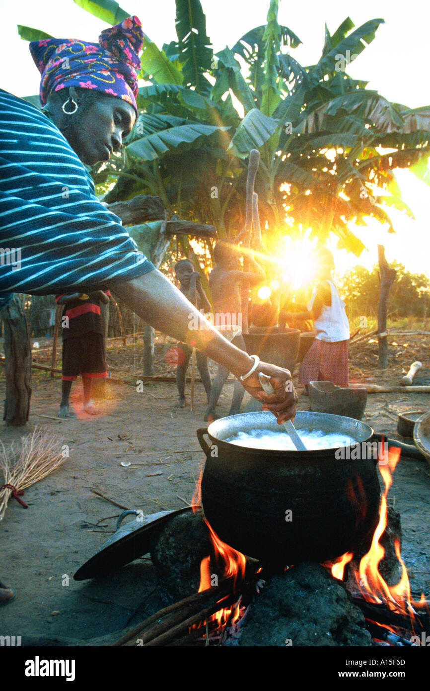Fama Balde prepares rice in the Muslim Fulani village of Dembel Jumpora ...