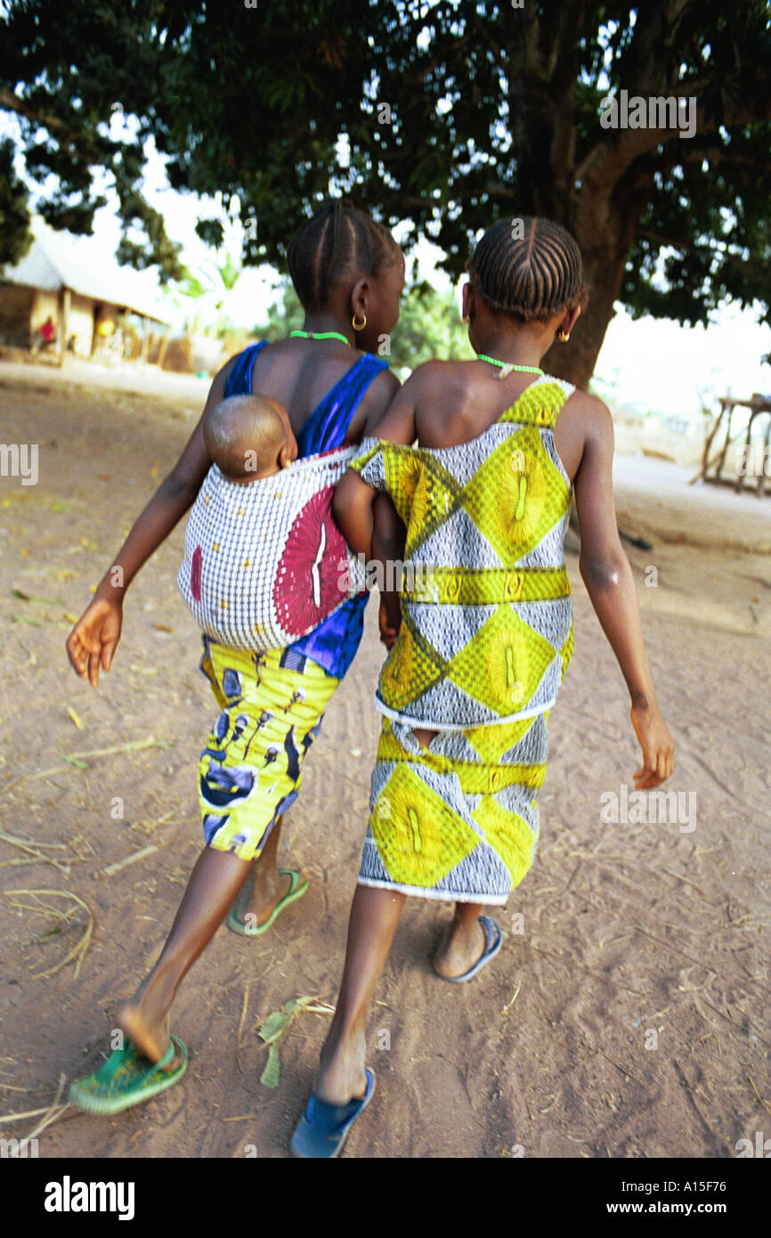 Children are already caring for babies while their mothers work in the ...