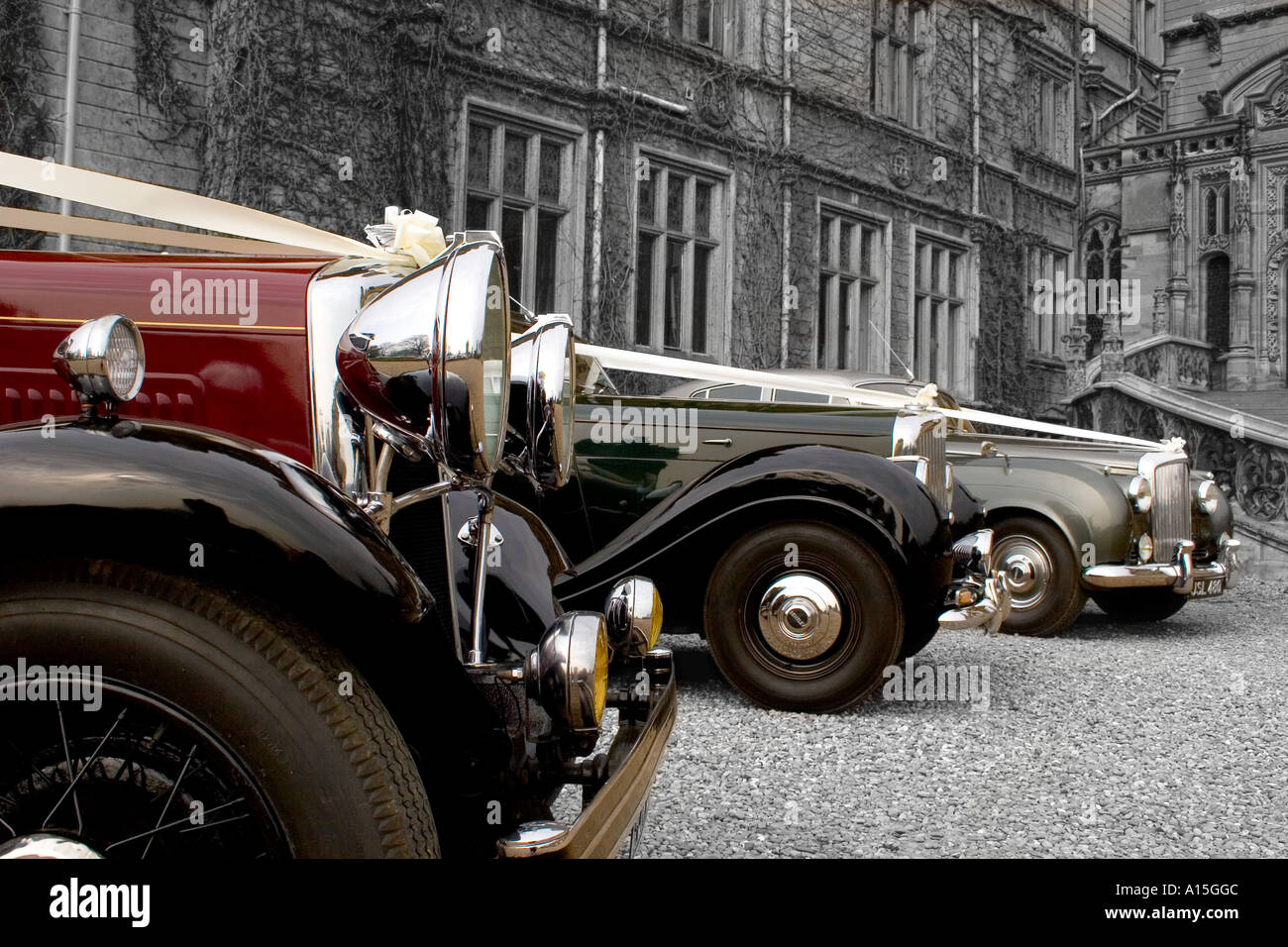 Wedding cars lined up in front of a stately home half black and white ...
