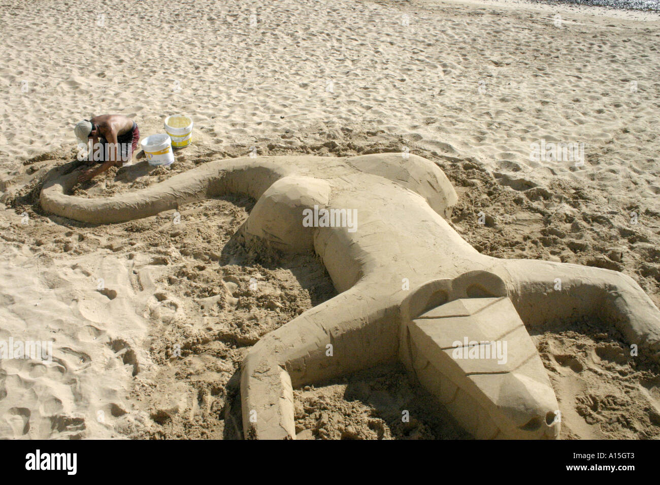 Crocodile sand sculpture Stock Photo - Alamy