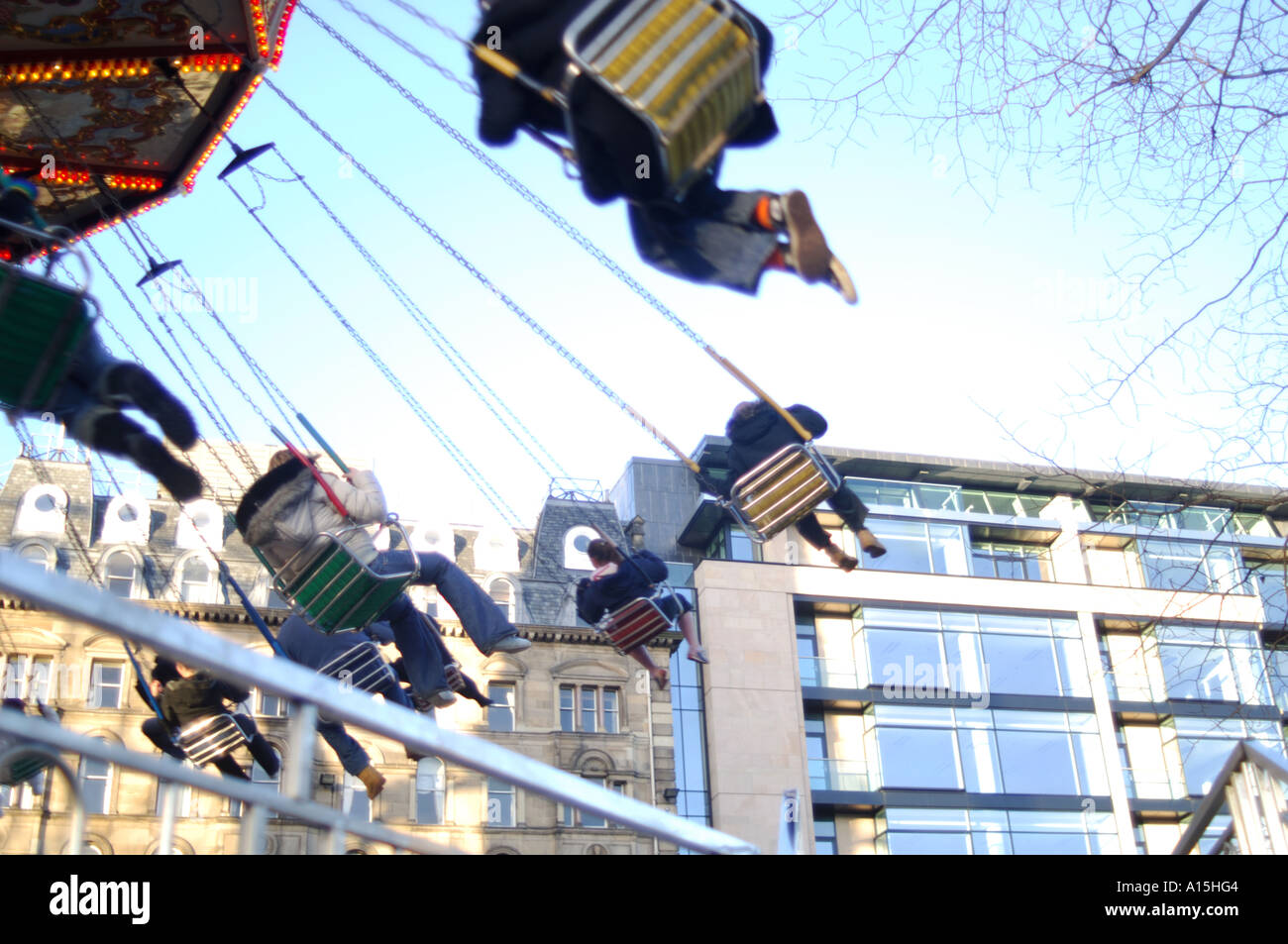People flying through the air on a fairground ride on Princes Street in ...