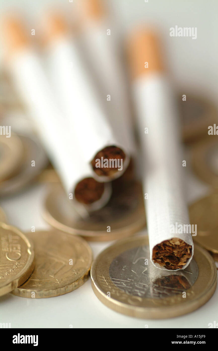 cigaret and money Stock Photo - Alamy