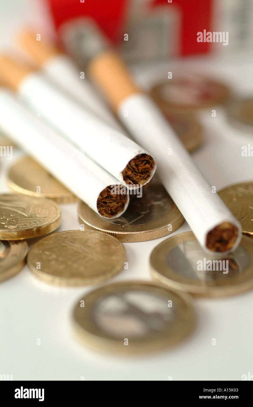 cigaret and money Stock Photo - Alamy