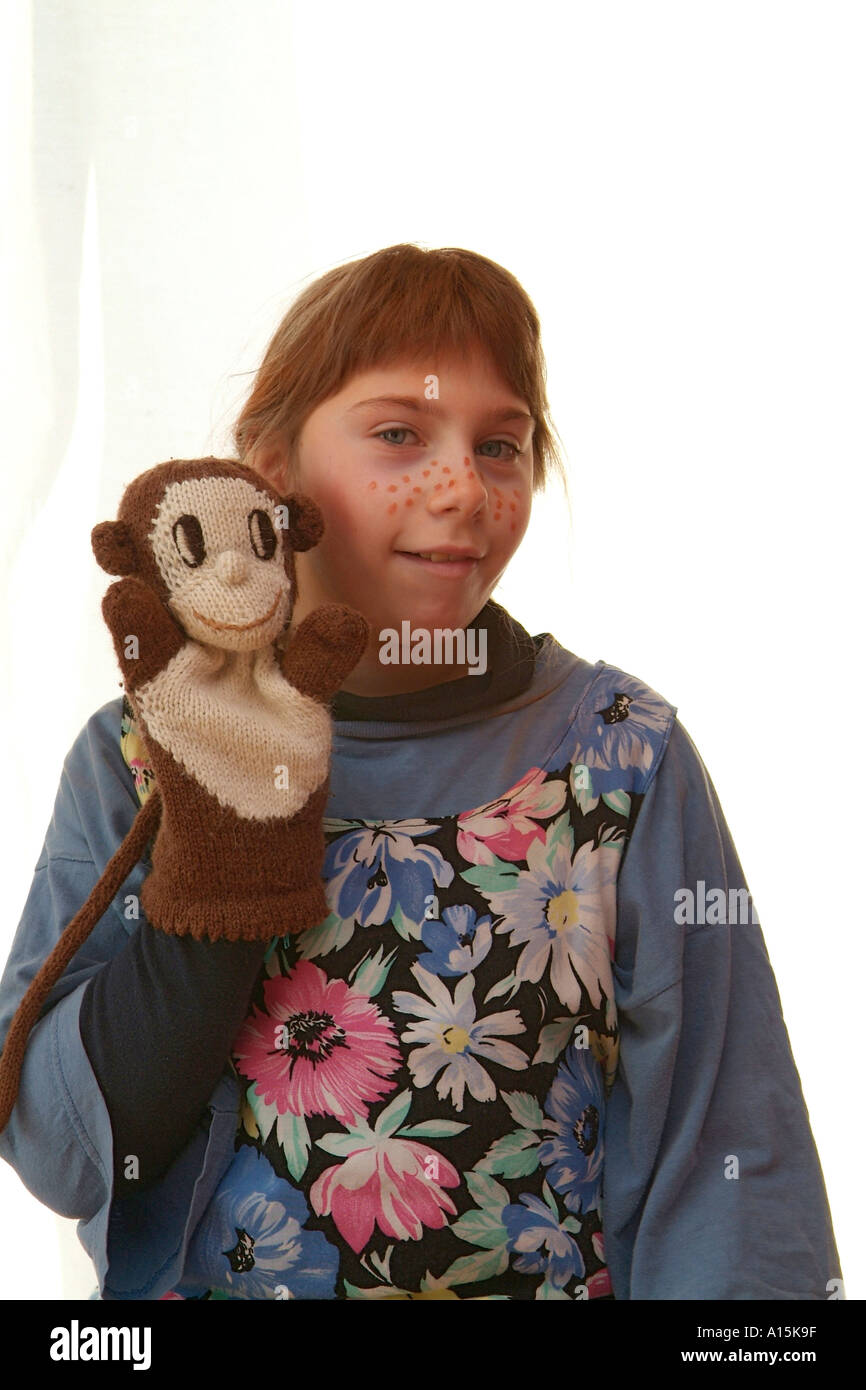 girl with hand puppet pippi longstockings Stock Photo - Alamy