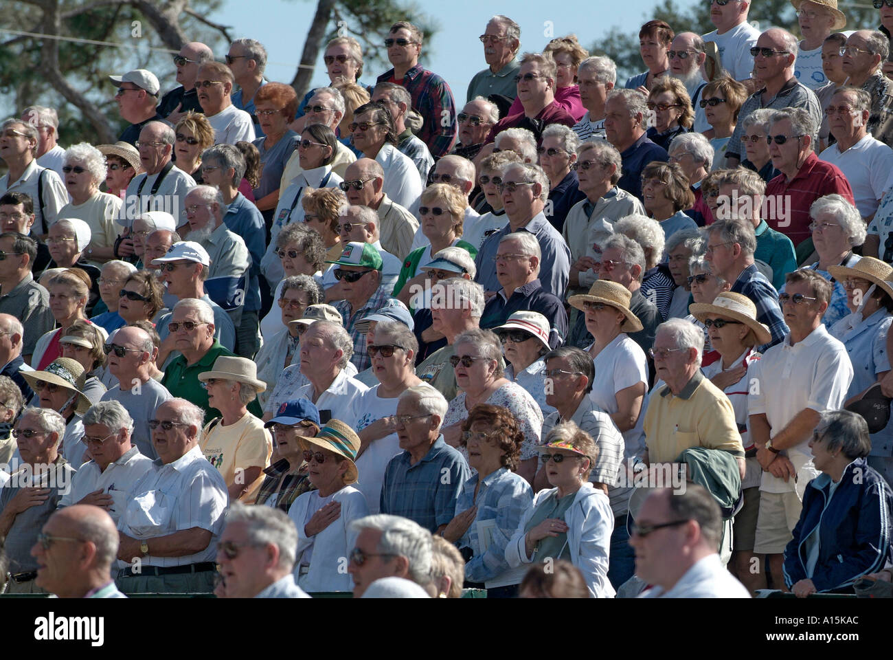 Large group of people watch a sporting event Stock Photo - Alamy