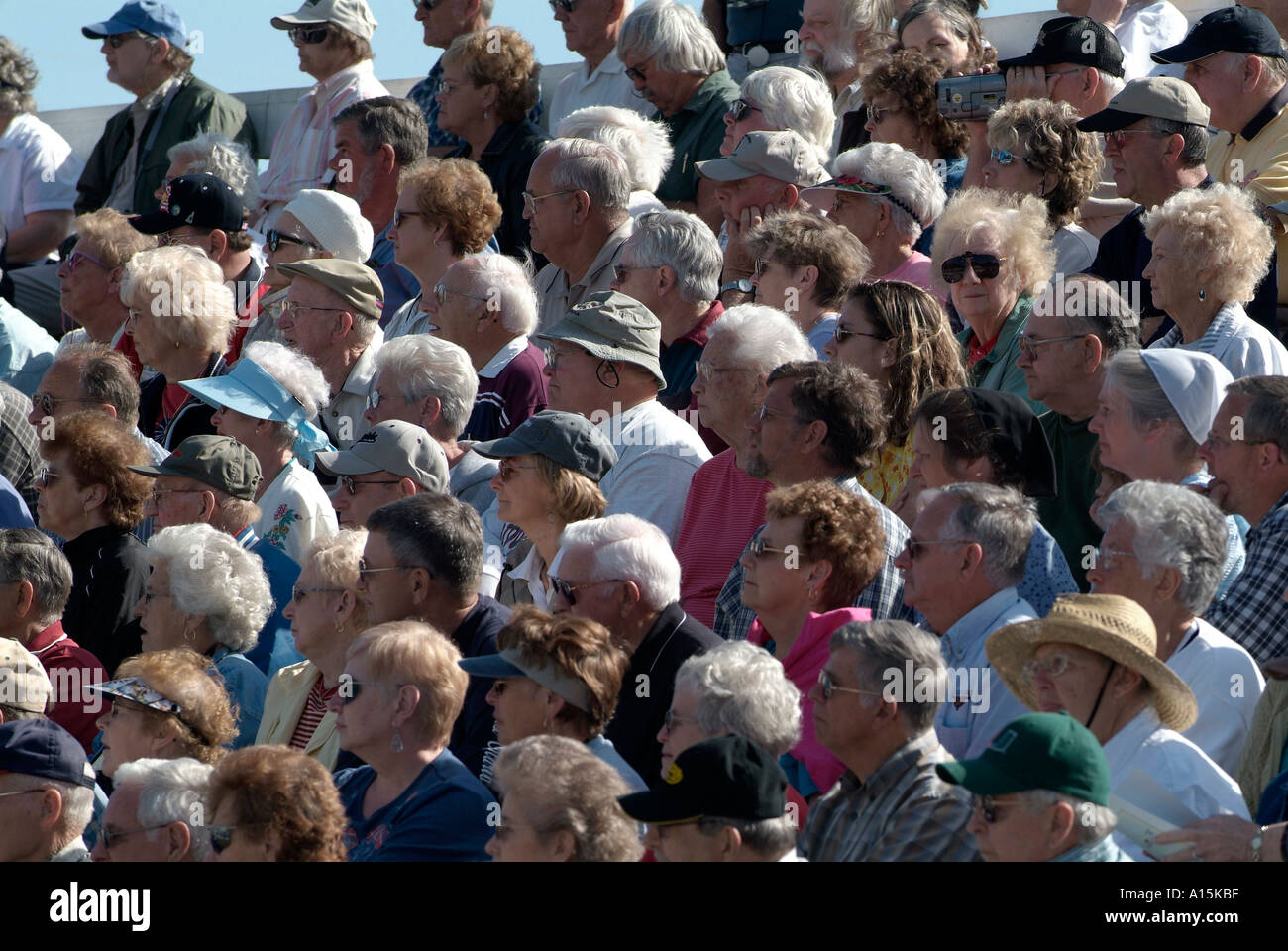 Large group of people watch a sporting event Stock Photo - Alamy