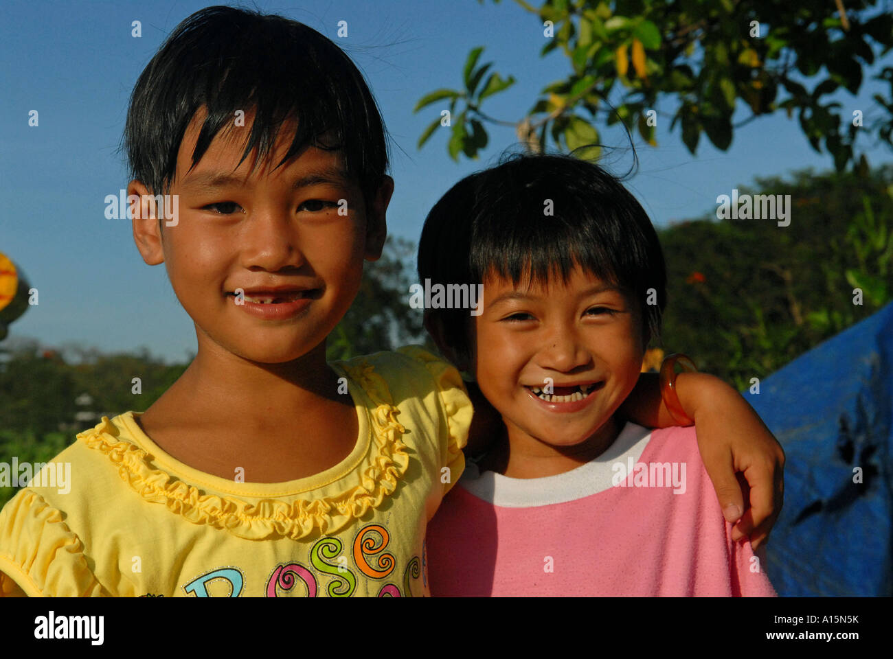 Vietnamese children portrait city of Hue Stock Photo - Alamy