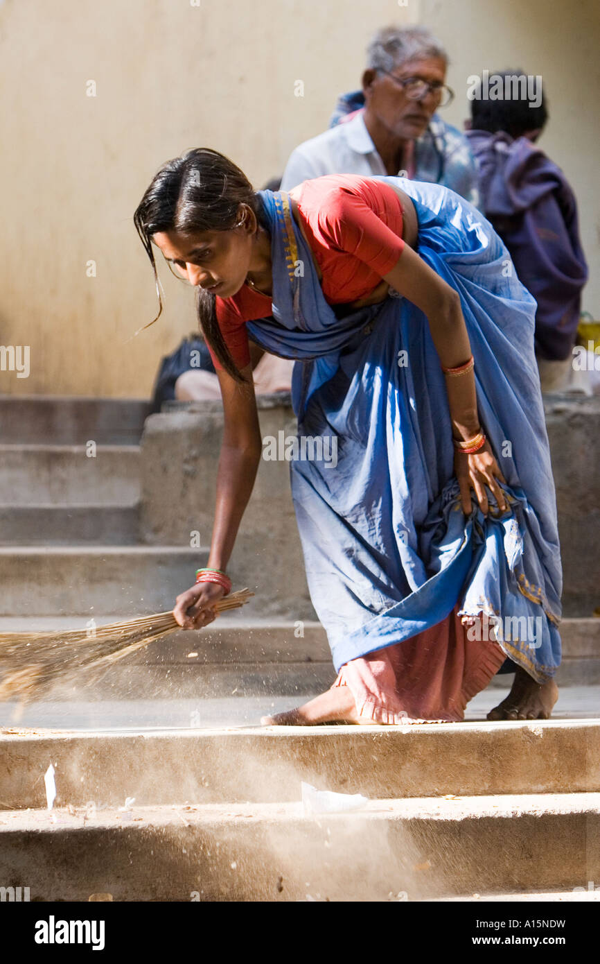 Woman sweeping steps hi-res stock photography and images - Alamy