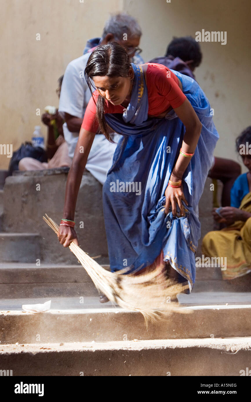 Woman sweeping steps hi-res stock photography and images - Alamy