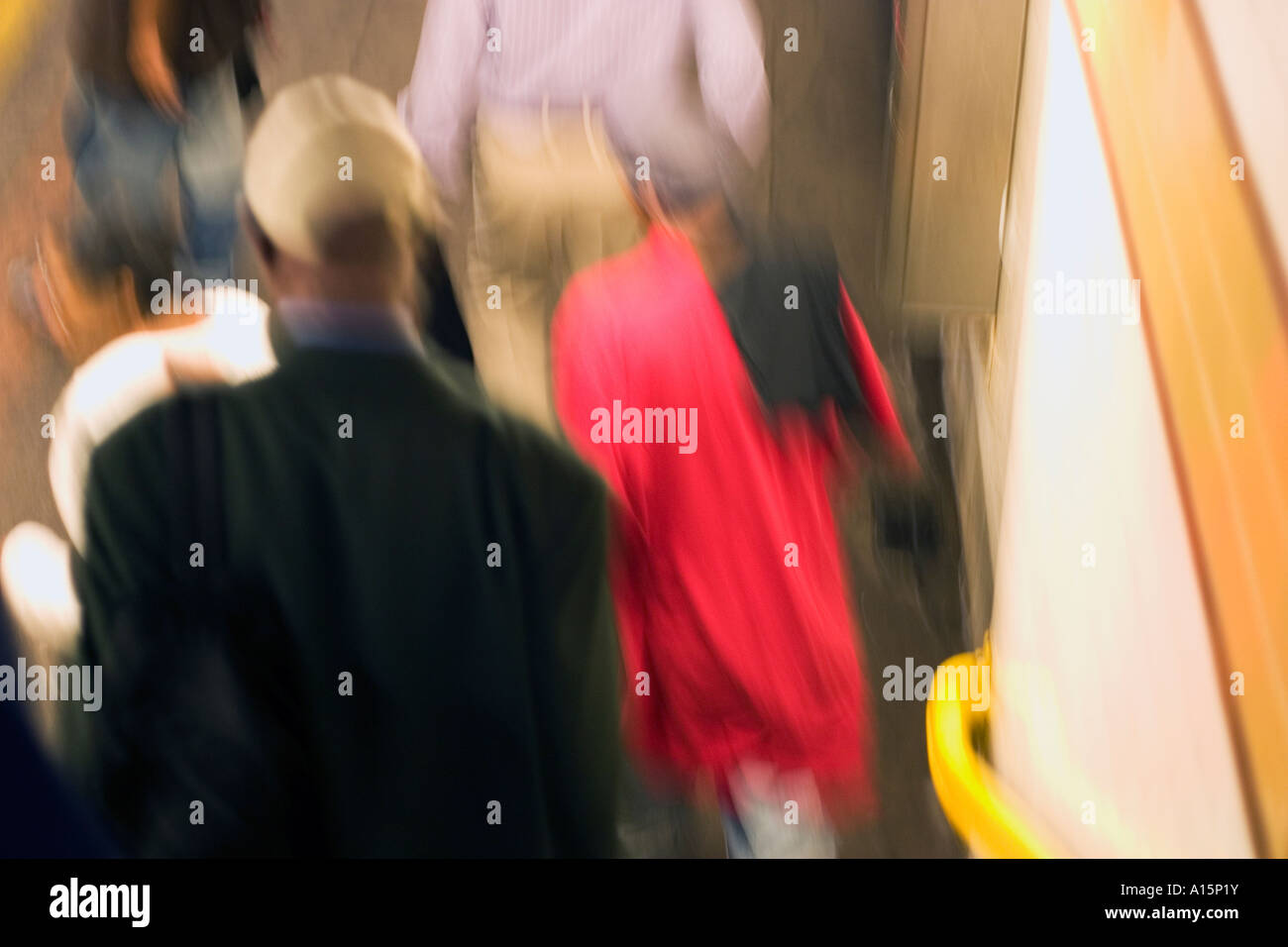 Blurred people moving through a subway station Stock Photo - Alamy