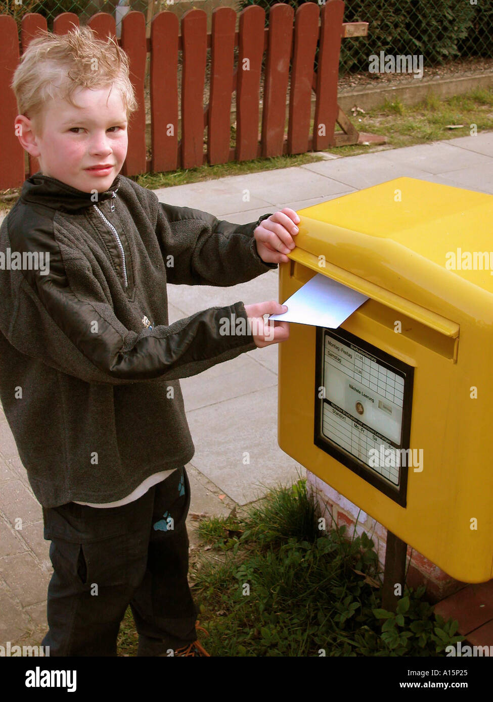 Boy post box letter hi-res stock photography and images - Alamy