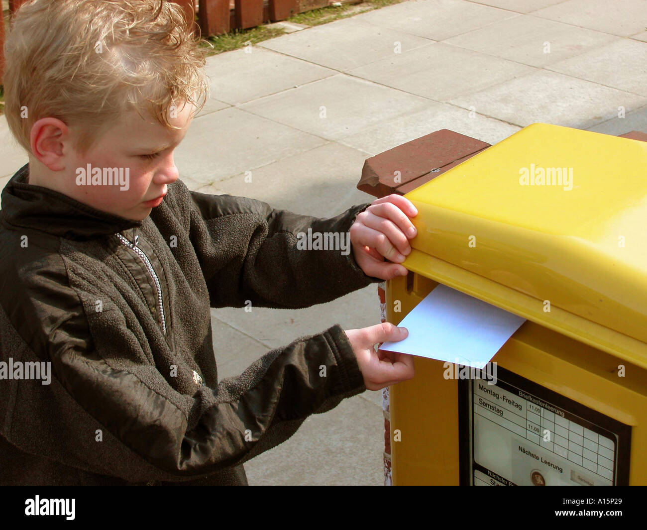 Boy post box letter hi-res stock photography and images - Alamy