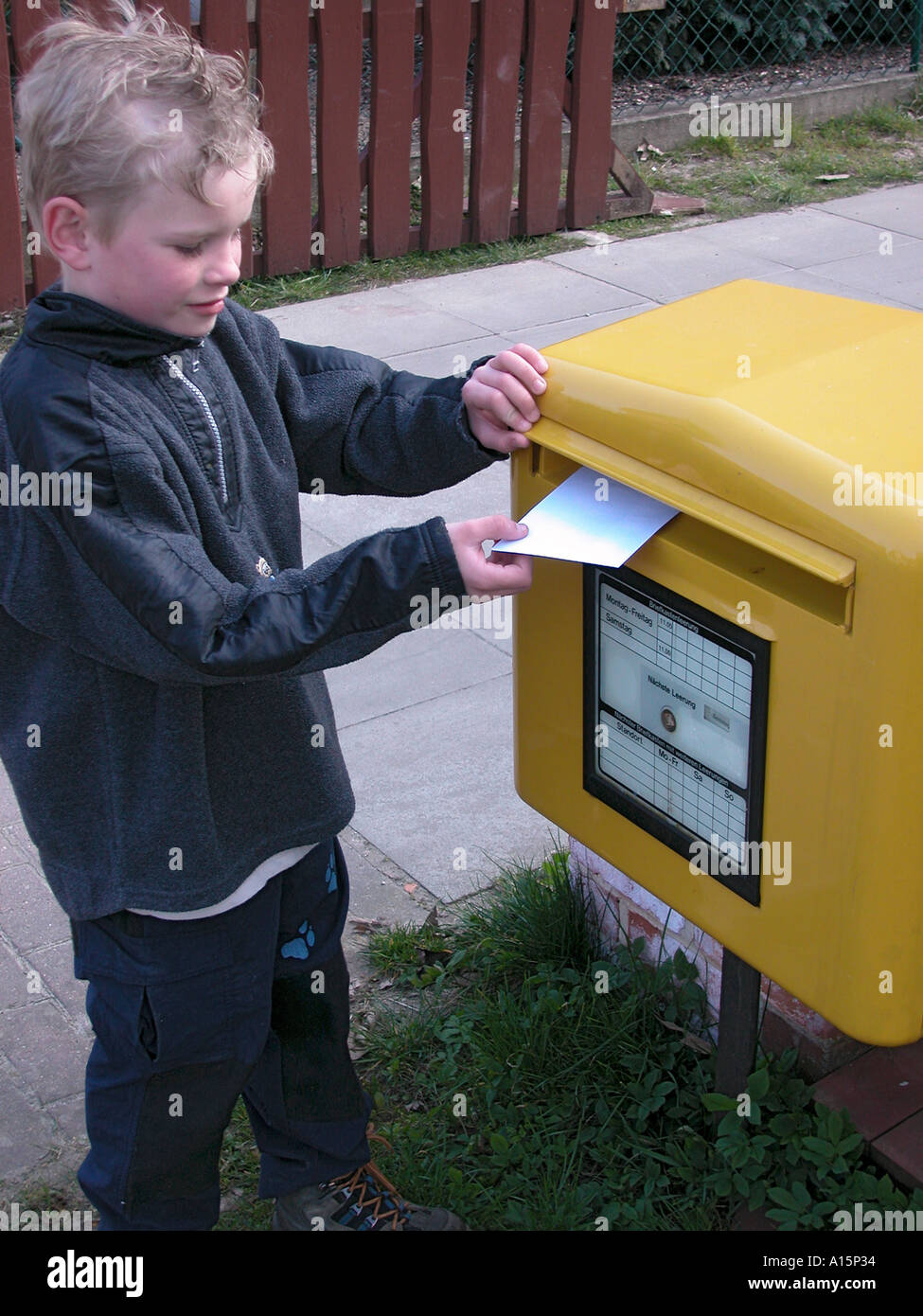 child at the post box Stock Photo - Alamy