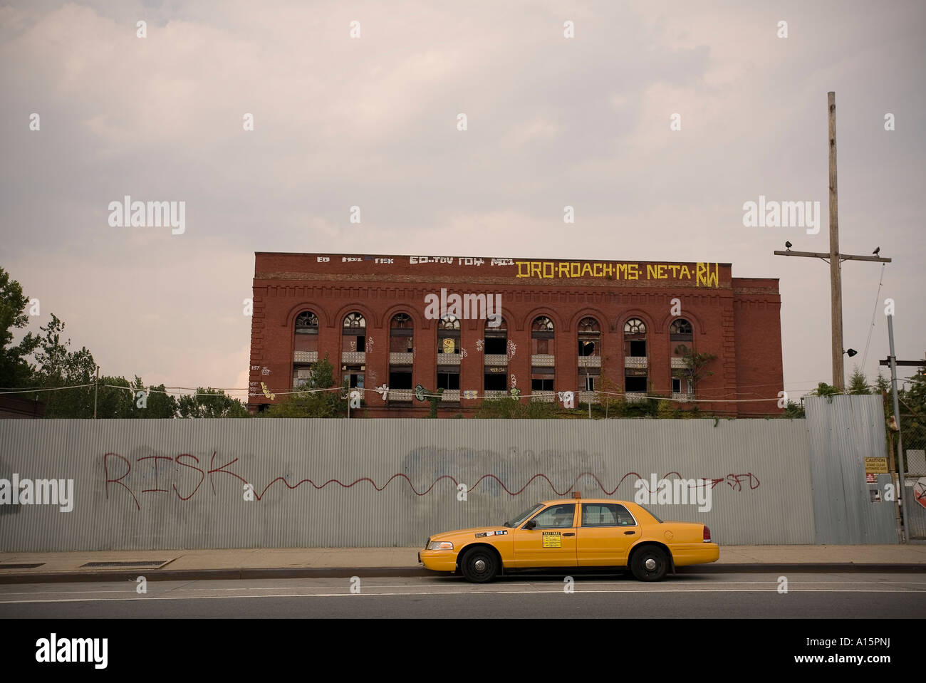 taxi in front of building Stock Photo - Alamy