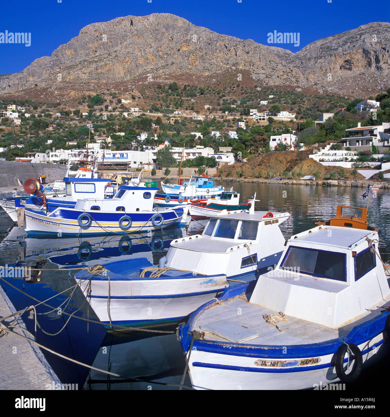 MASOURI HARBOUR KAKYMNOS GREECE boats fishing Stock Photo - Alamy