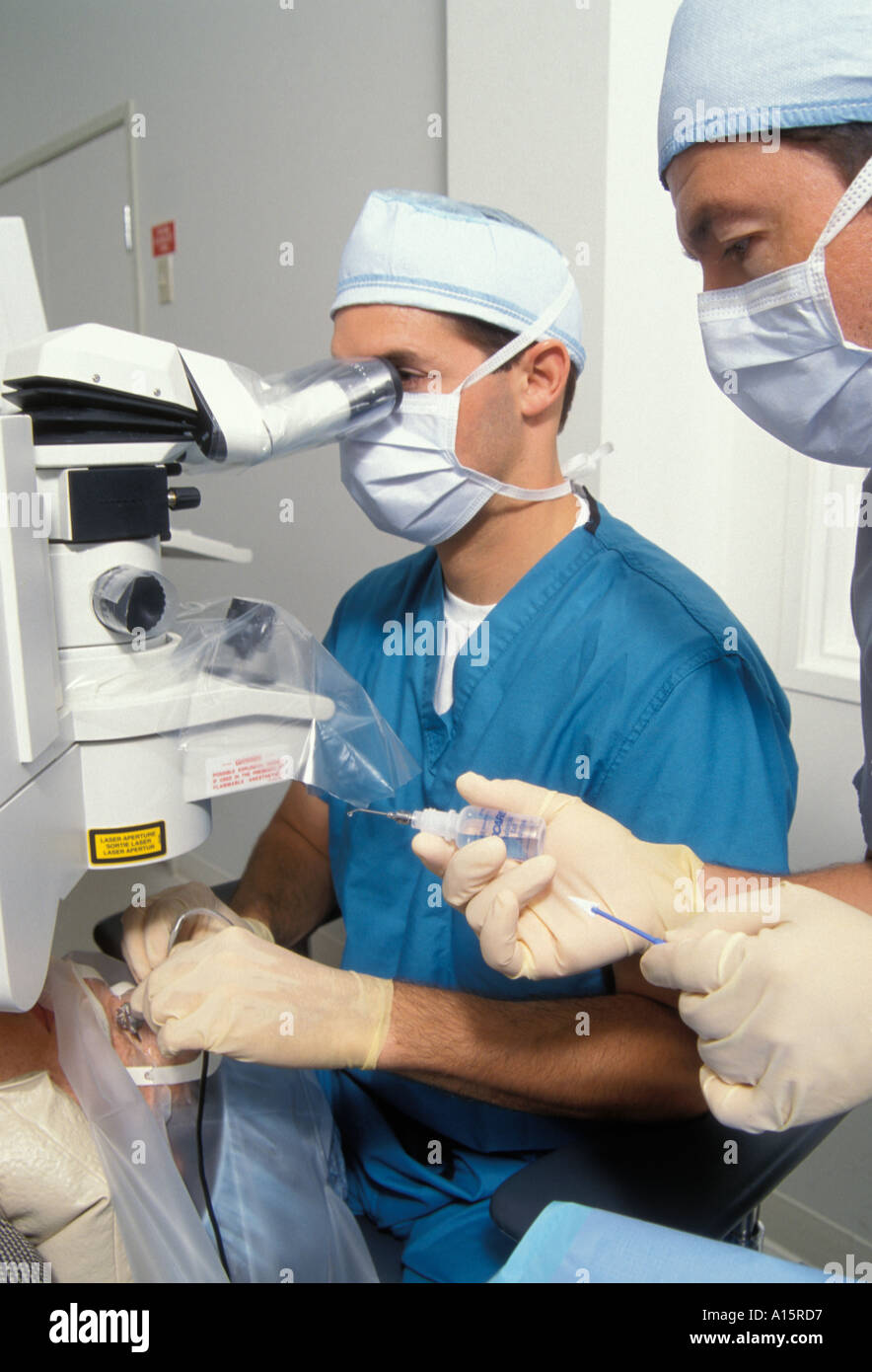 Three men operate hi-res stock photography and images - Alamy