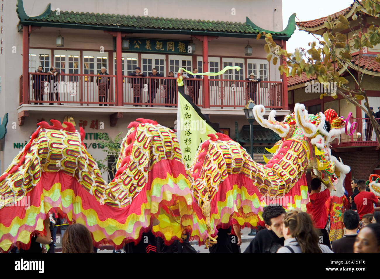 Chinese New Year parade with Chinese dragon carried by men at festival ...