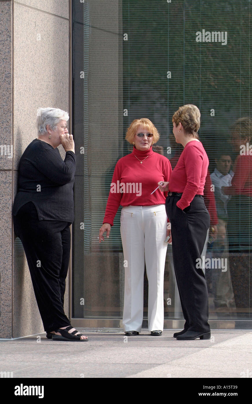 Workers are forced to smoke cigarettes outside of buildings and ...