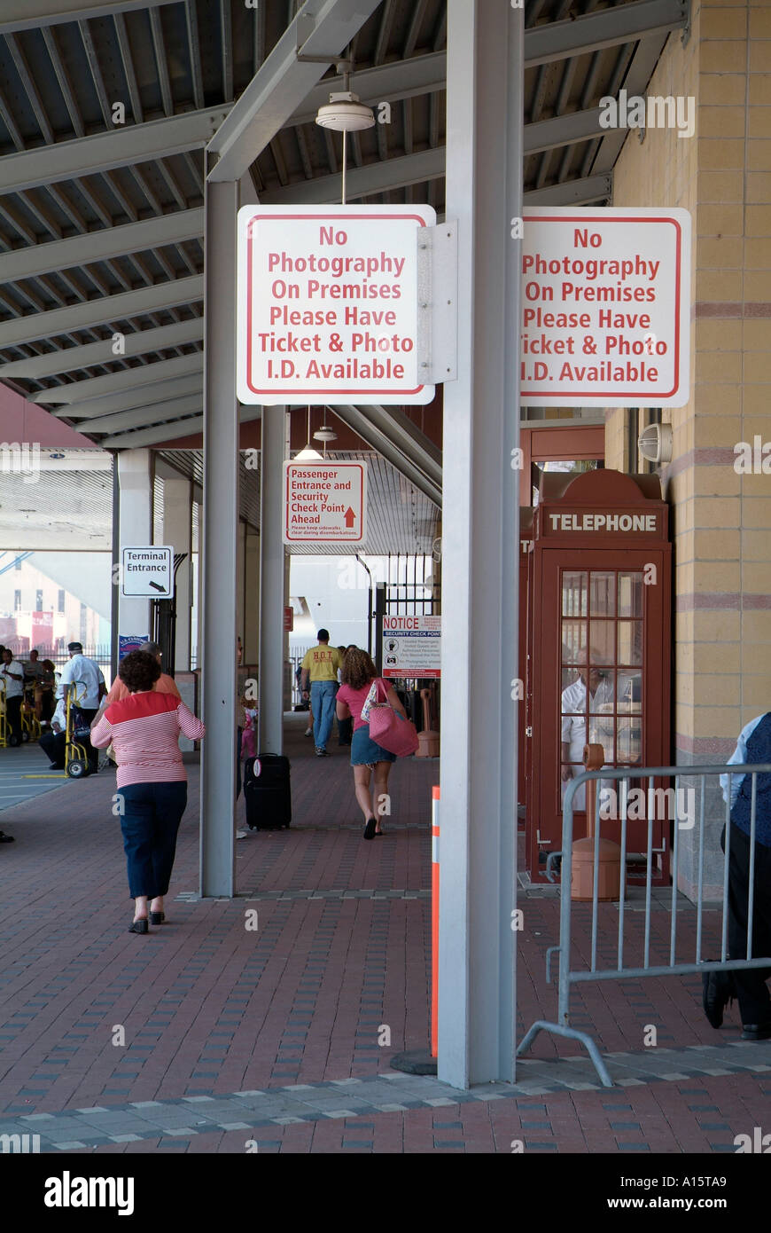 Signs to entrance of cruise ship prohibits photography and gives ...