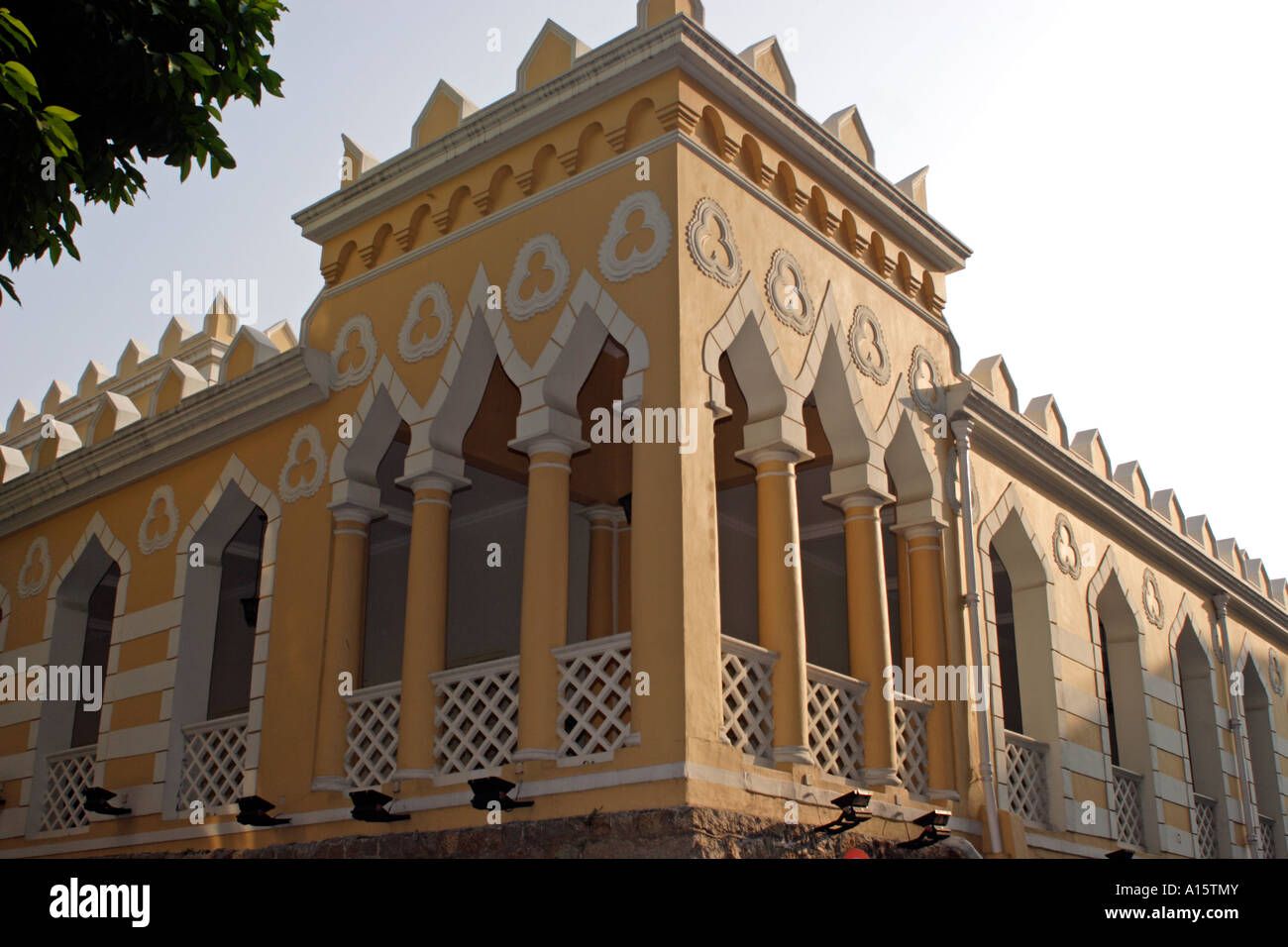 Yellow building in Macau Stock Photo - Alamy