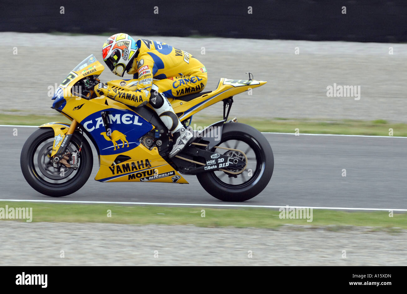 Valentino Rossi racing at speed on his M1 yamaha at Mugello in the 2006 ...