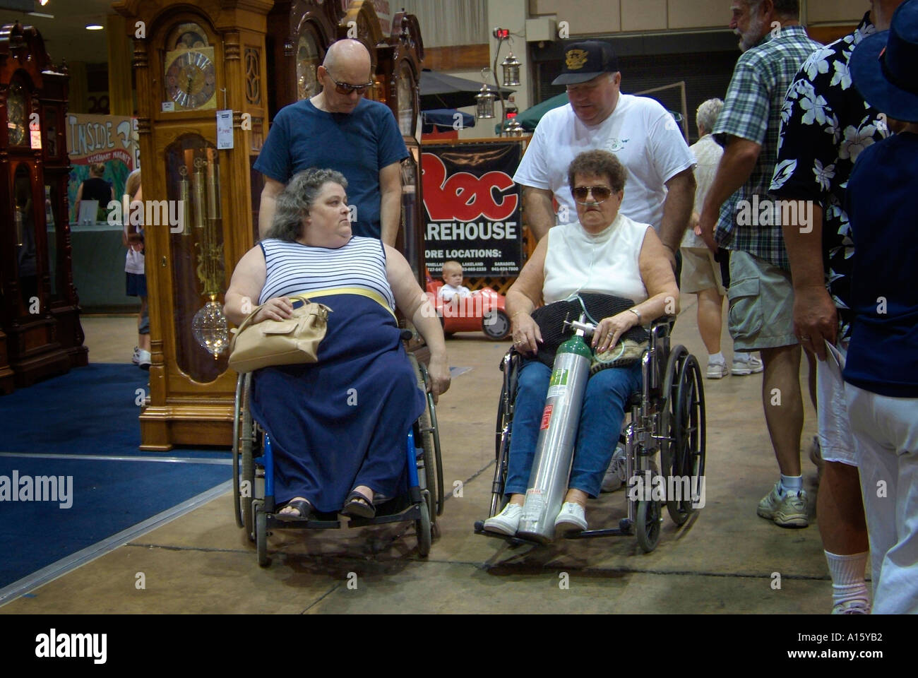 Handicapped person with oxygen tank in motorized wheelchair Stock Photo ...