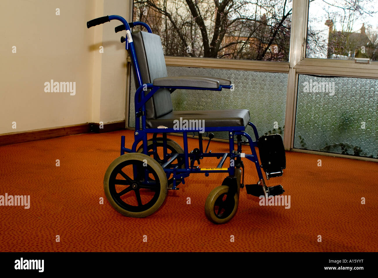 empty wheelchair in a hospital Stock Photo - Alamy