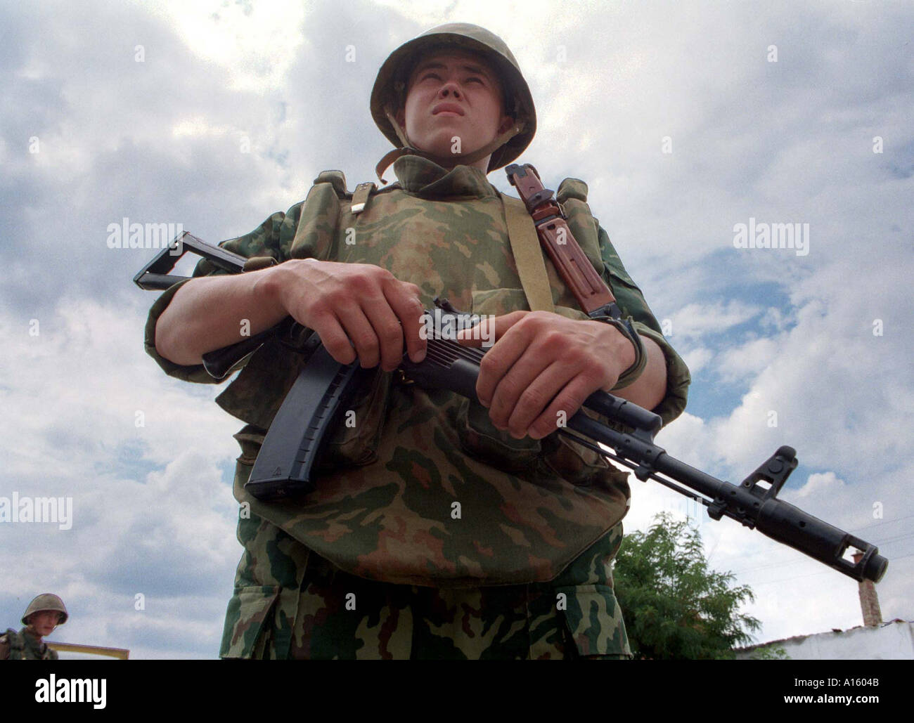 Russian soldiers guard a checkpoint near the village of Pasjane in ...