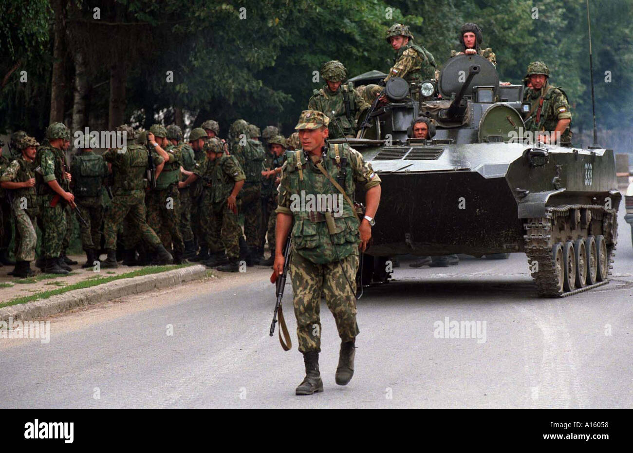 Russian troops create a roadblock in Kamenica nearby the village of ...