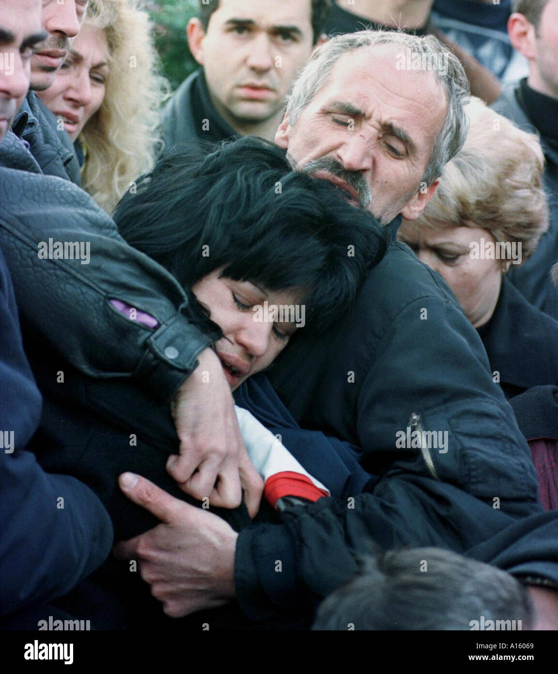 Family members mourn the loss of their son who was gunned downed the ...