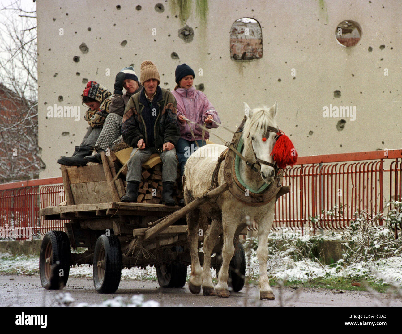 The Hadergodnaj family returns to their home in the village of Prilep ...