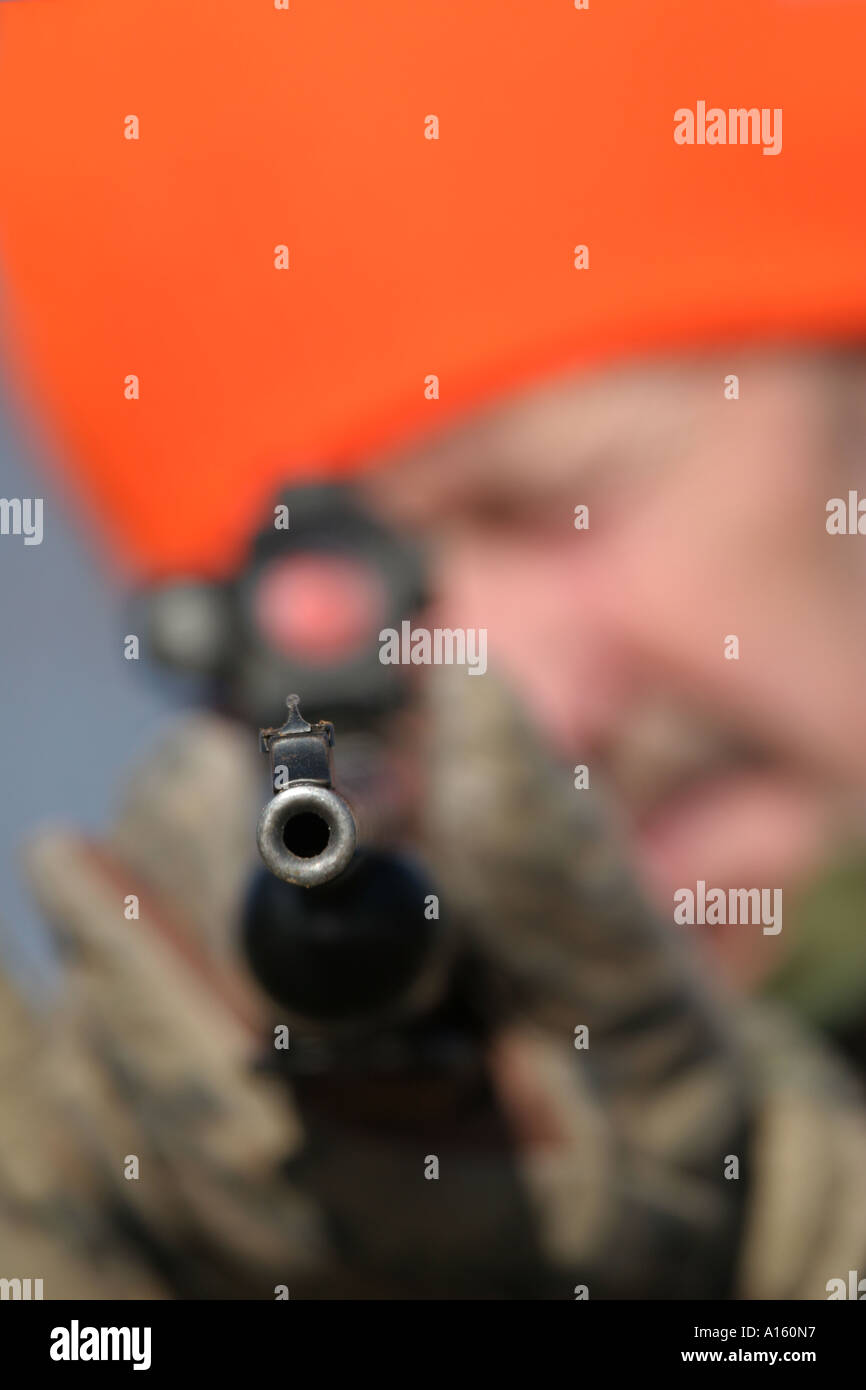 Hunter Staring down the barrel Stock Photo - Alamy