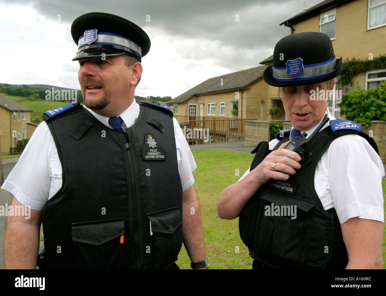 Police Community Support Officers on a foot patrol on a housing estate ...