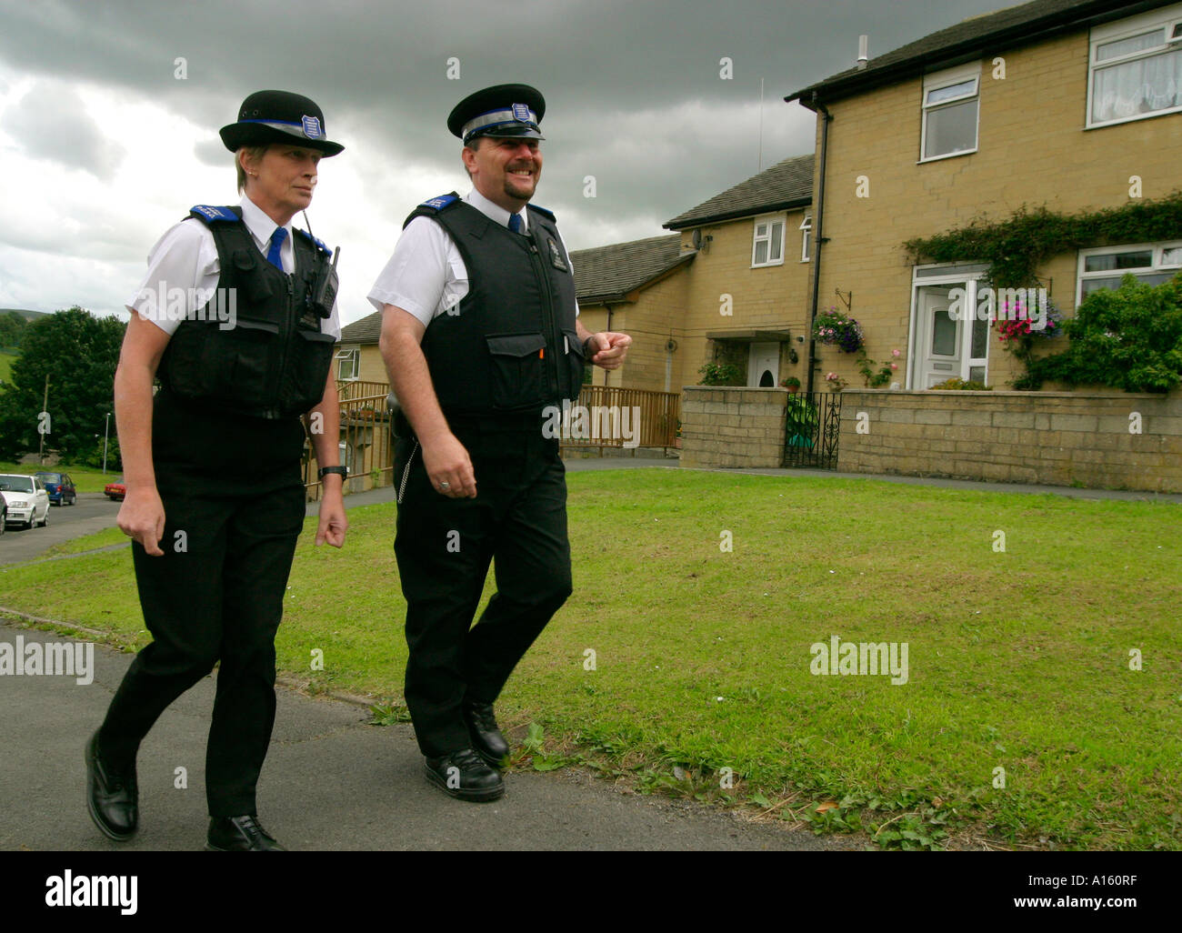 Police Community Support Officers on a foot patrol on a housing estate ...