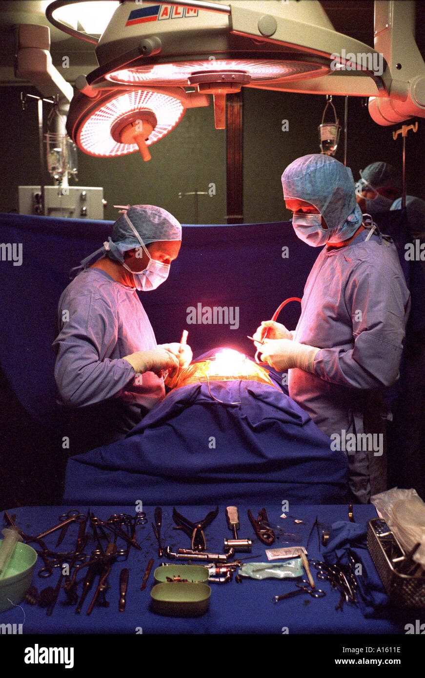 Doctors perform an operation at the Centre Medio-Chirurgical and ...