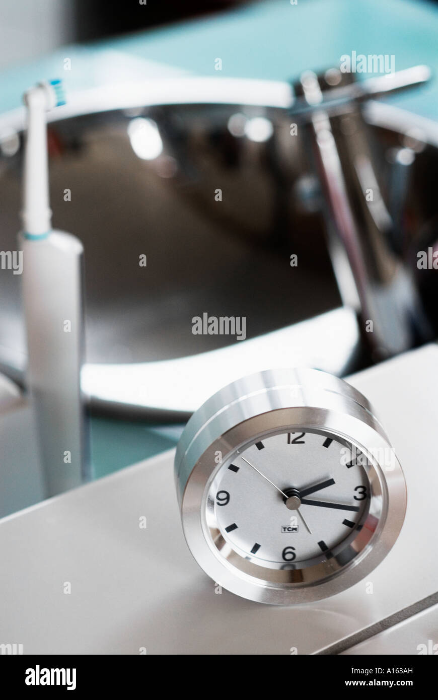 wash basin and a clock Stock Photo - Alamy