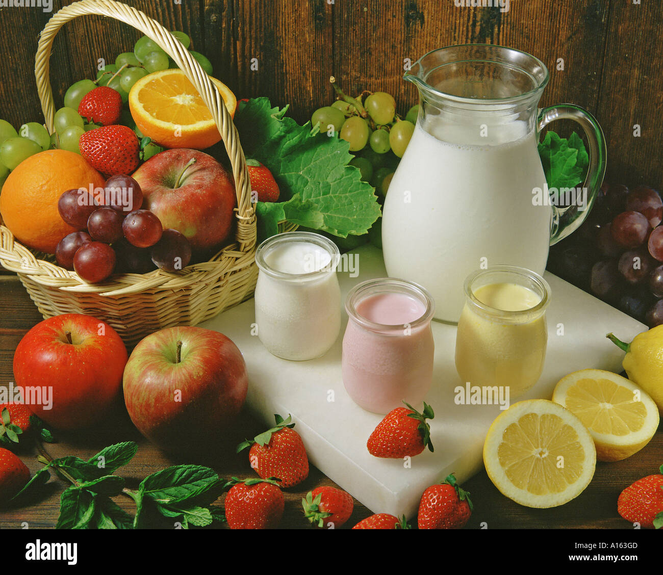 Yoghourts and fruit Stock Photo - Alamy