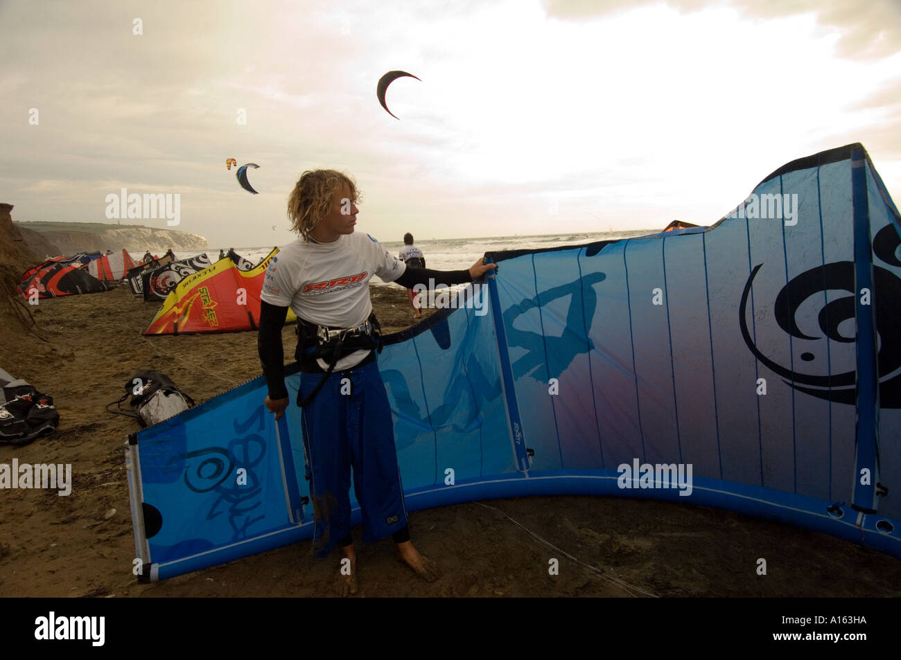 Kite surfing is a fast growing sport, the kites have inflatable ribs to ...