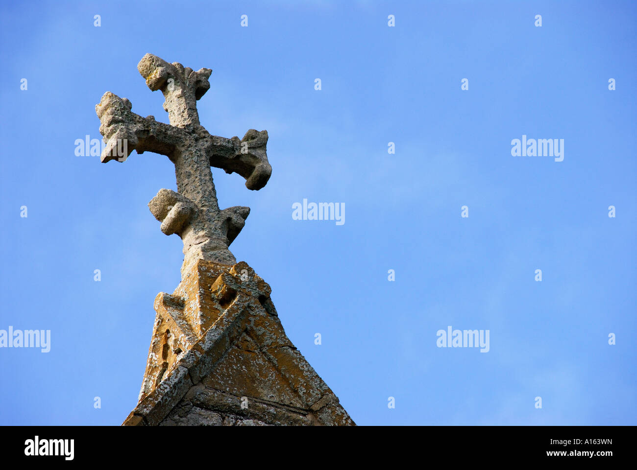 "Stone cross on church roof Stock Photo - Alamy