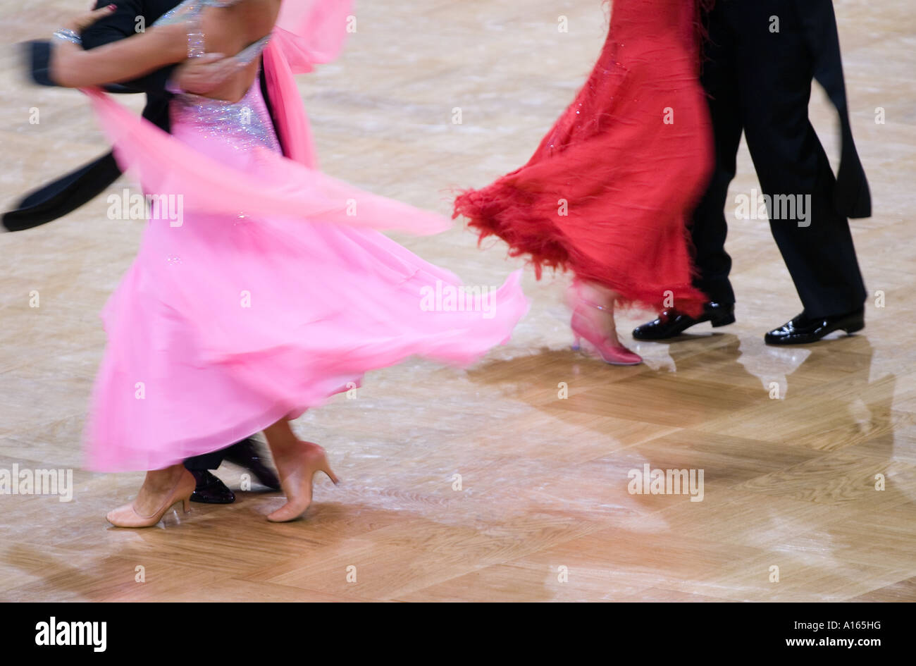 Professional ballroom dancers performing in the Standard Dance ...