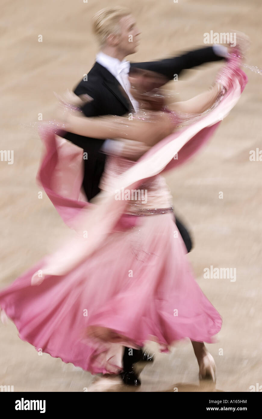 Professional ballroom dancers performing in the Standard Dance ...