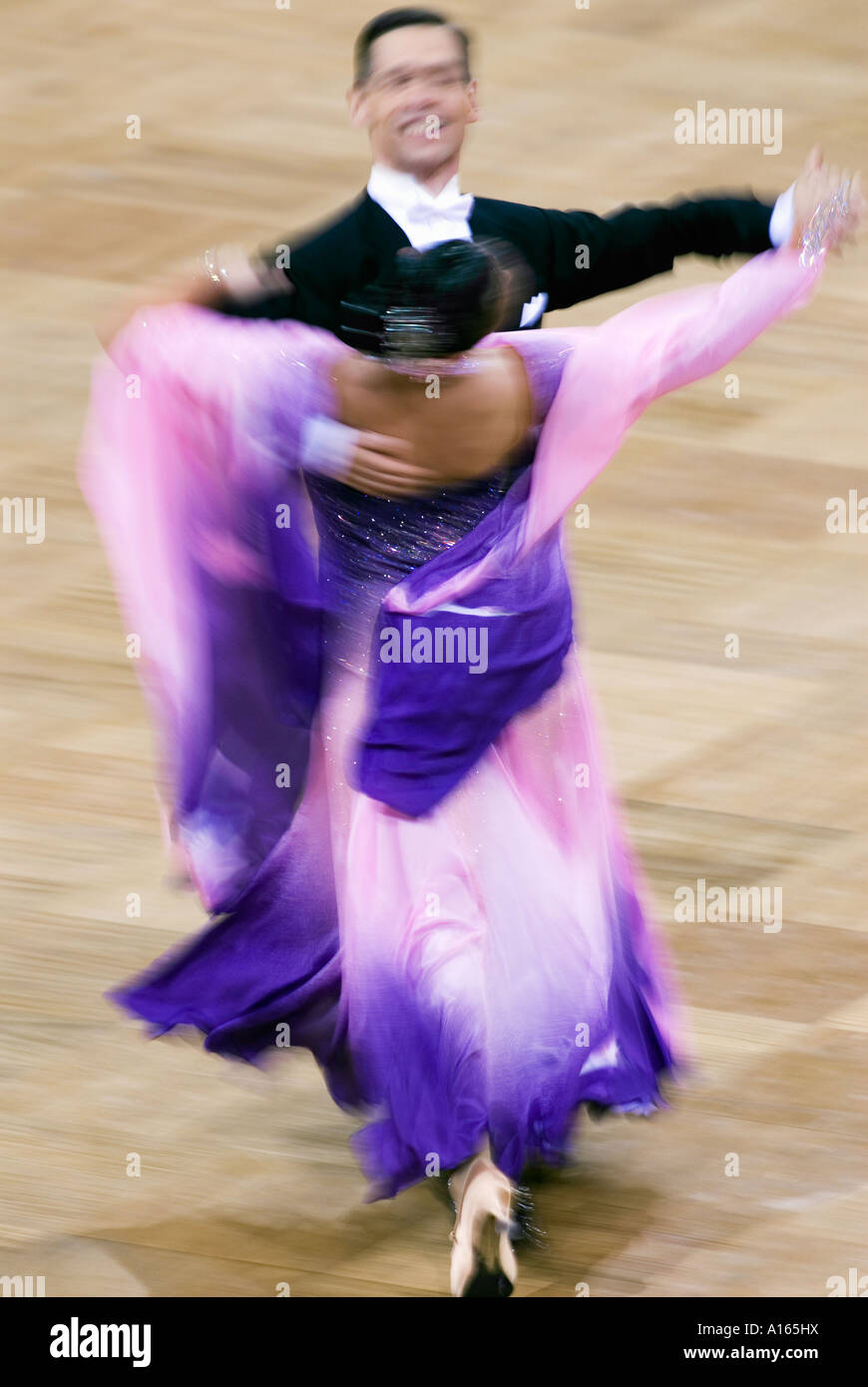 Professional ballroom dancers performing in the Standard Dance ...