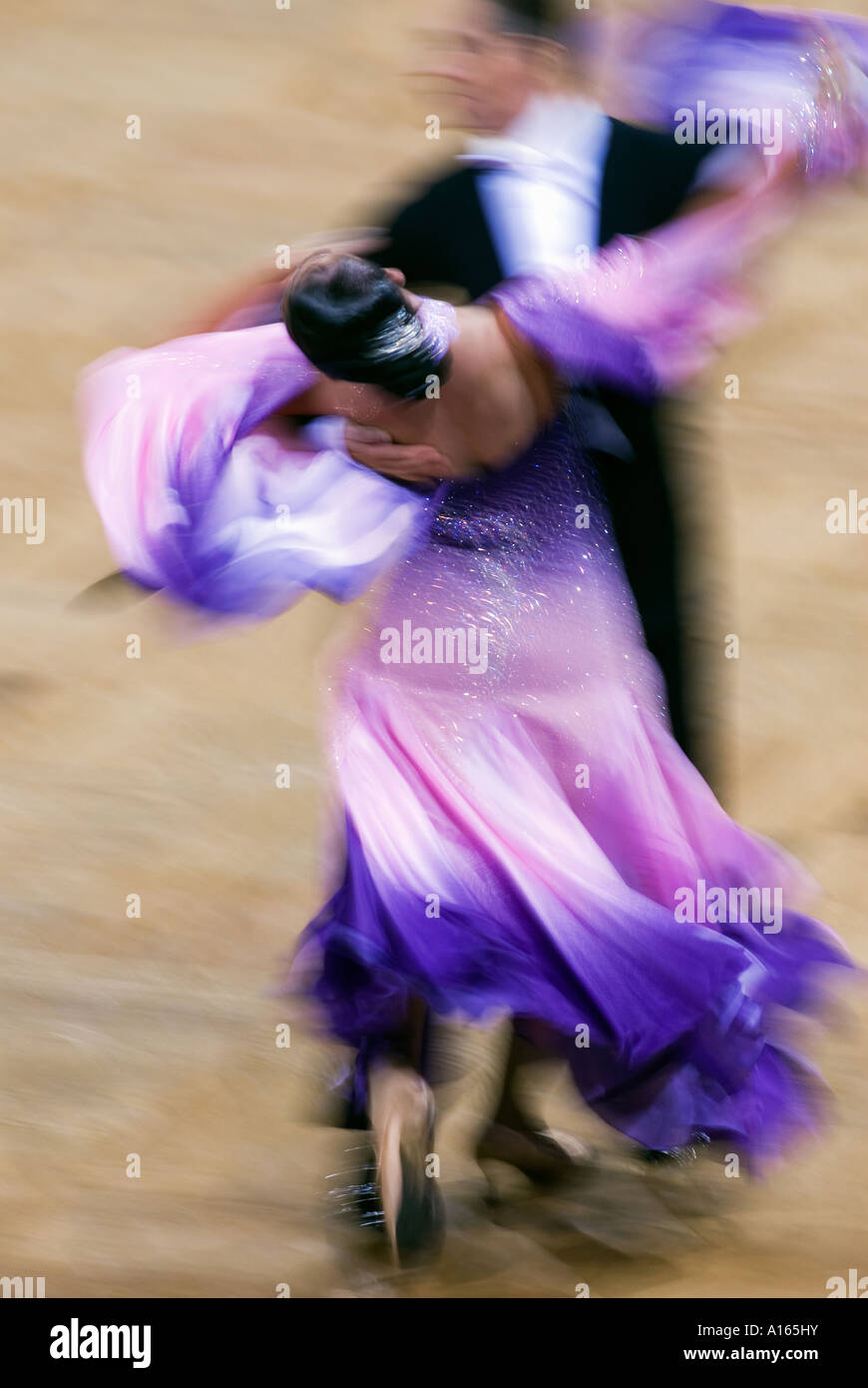 Professional ballroom dancers performing in the Standard Dance ...