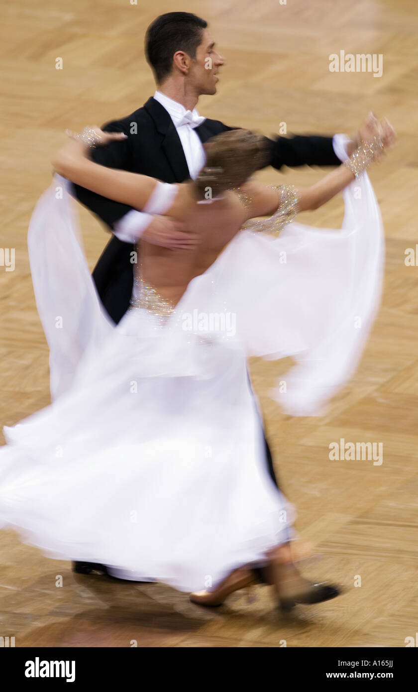 Professional ballroom dancers performing in the Standard Dance ...
