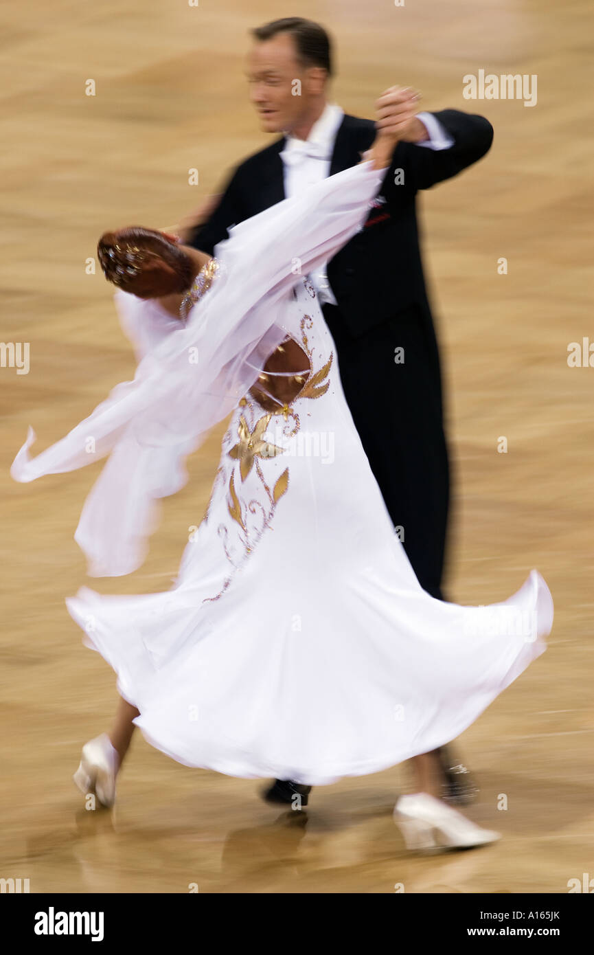 Professional ballroom dancers performing in the Standard Dance ...