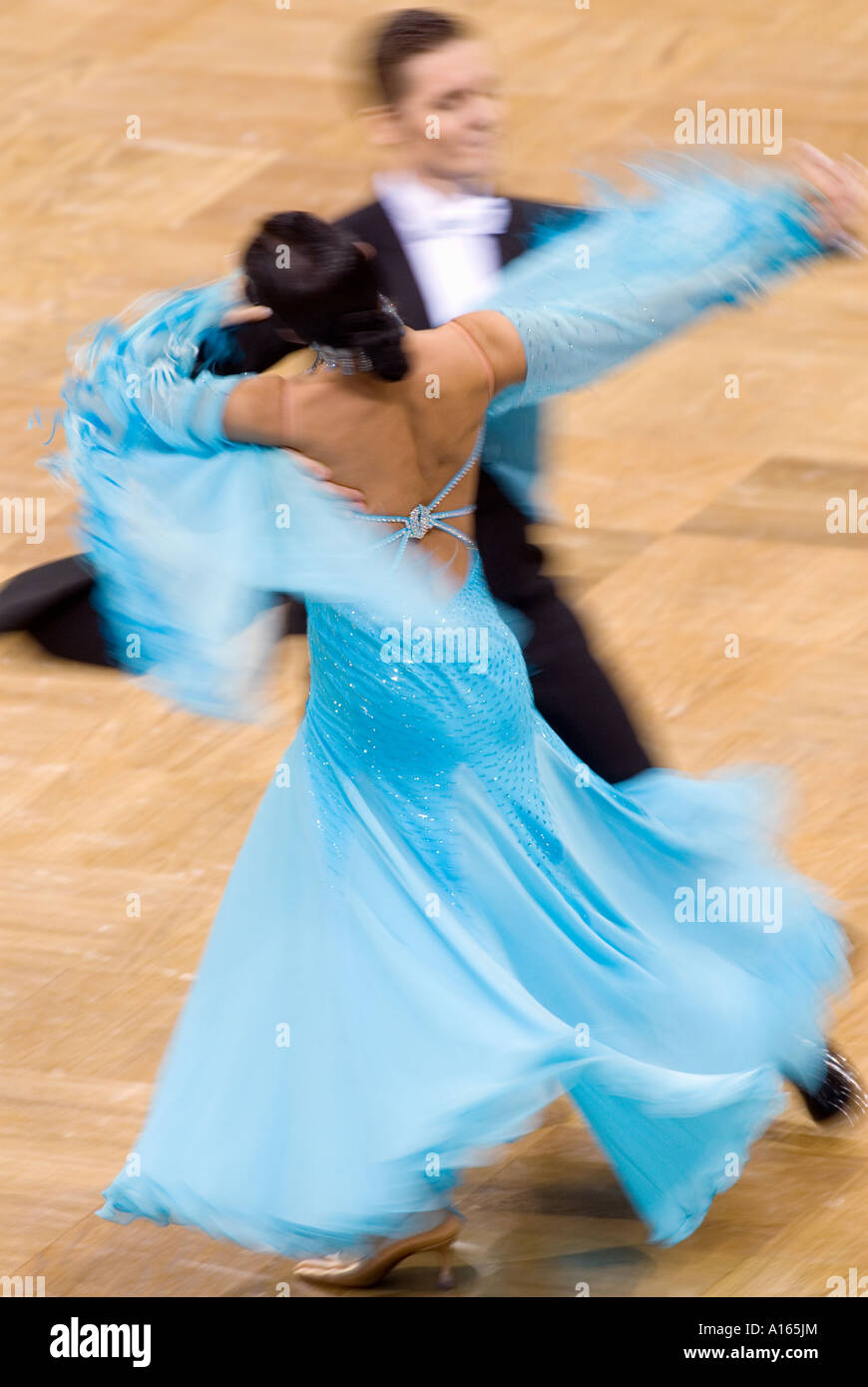 Professional ballroom dancers performing in the Standard Dance ...