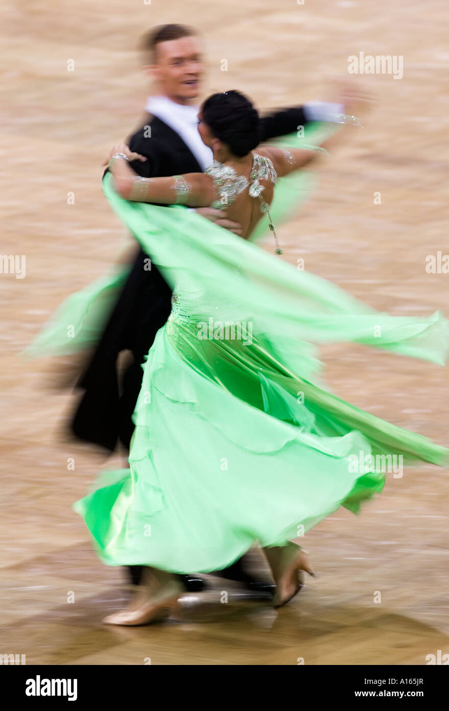 Professional ballroom dancers performing in the Standard Dance ...