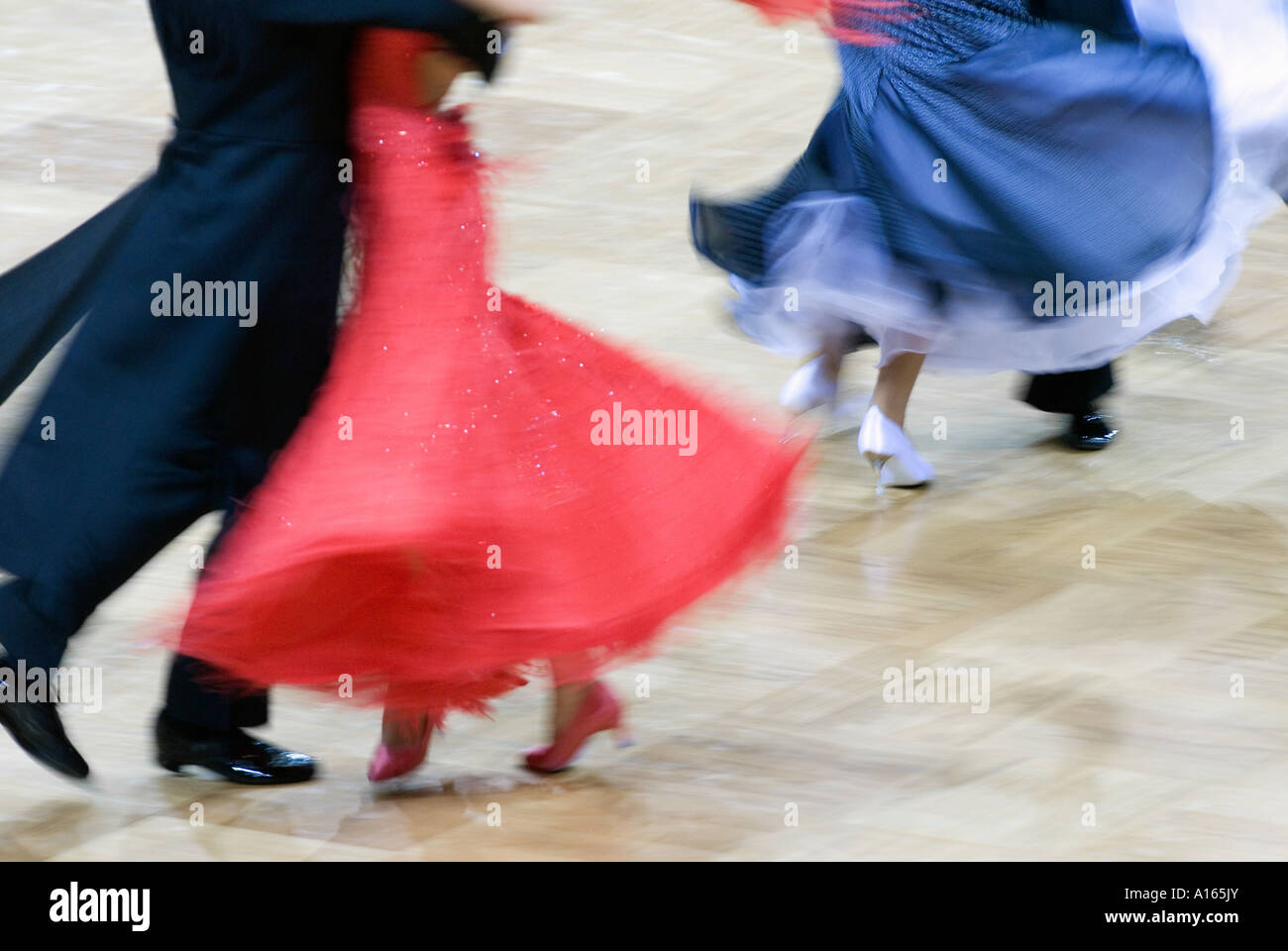 Professional ballroom dancers performing in the Standard Dance ...