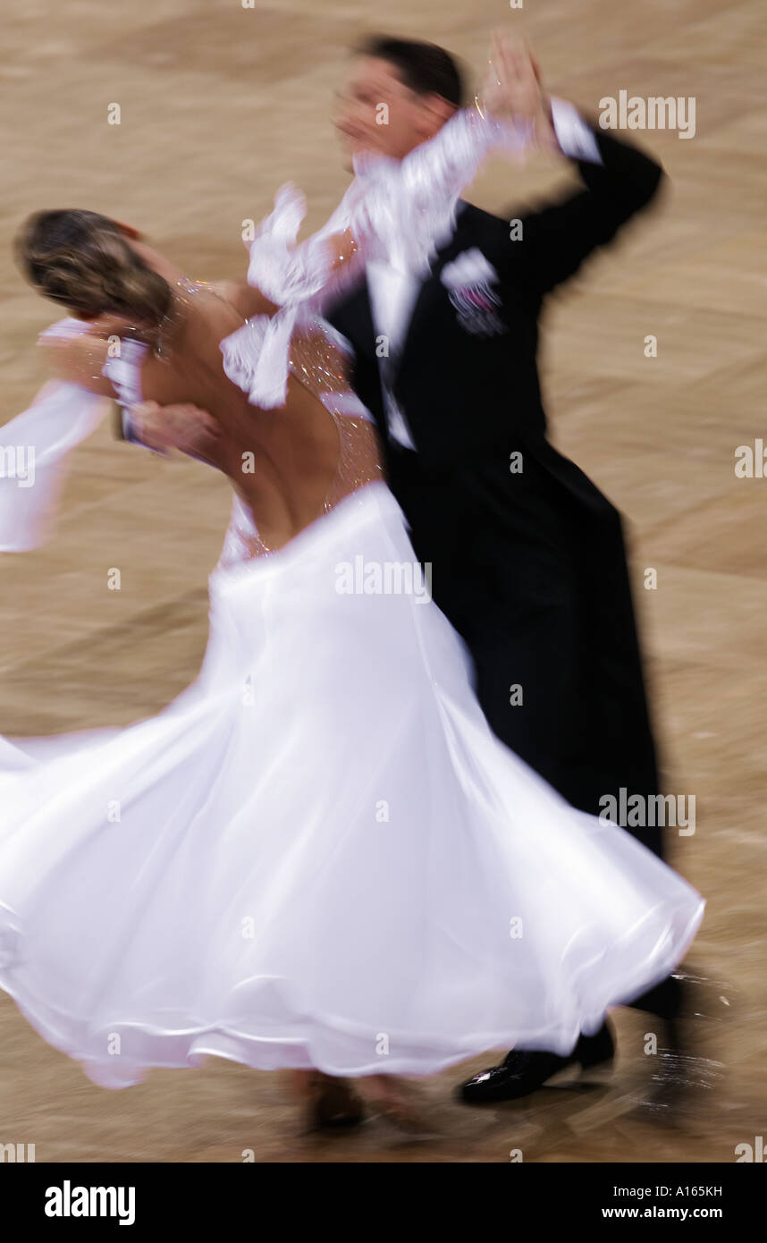 Professional ballroom dancers performing in the Standard Dance ...