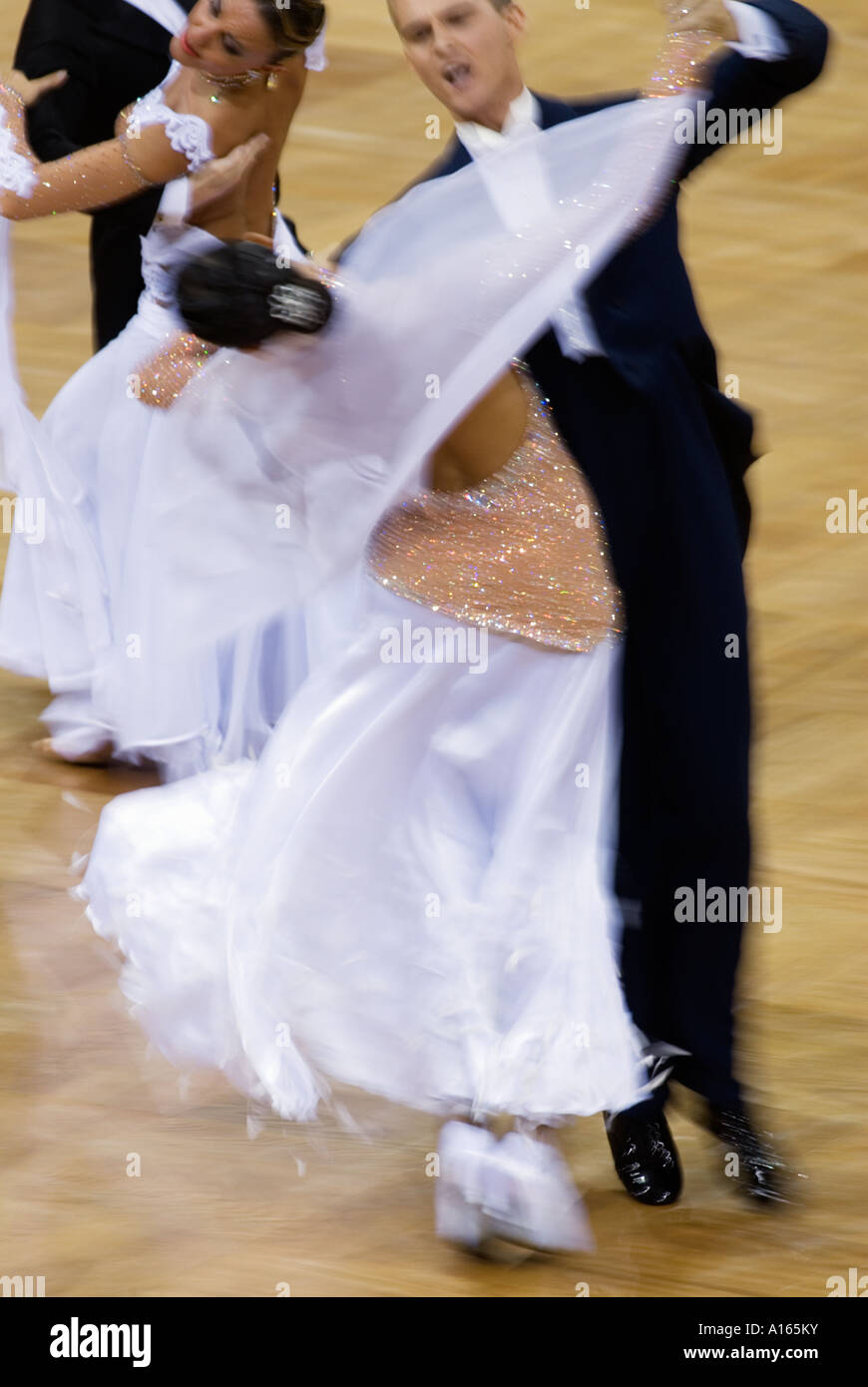 Professional ballroom dancers performing in the Standard Dance ...